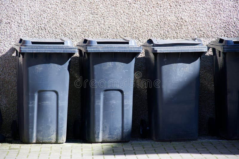 Wheelie Bins in Row for Refuge Collection Outdoors Stock Image - Image ...