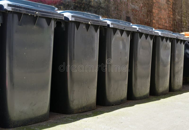 Wheelie Bins in Row for Refuge Collection Outdoors Stock Photo - Image ...