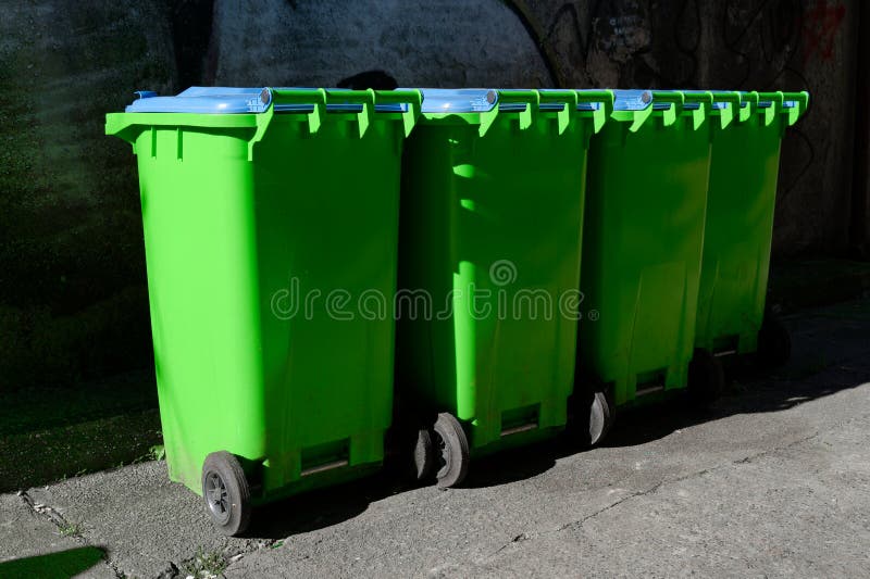 Wheelie Bins in Row for Refuge Collection Outdoors Stock Image - Image ...