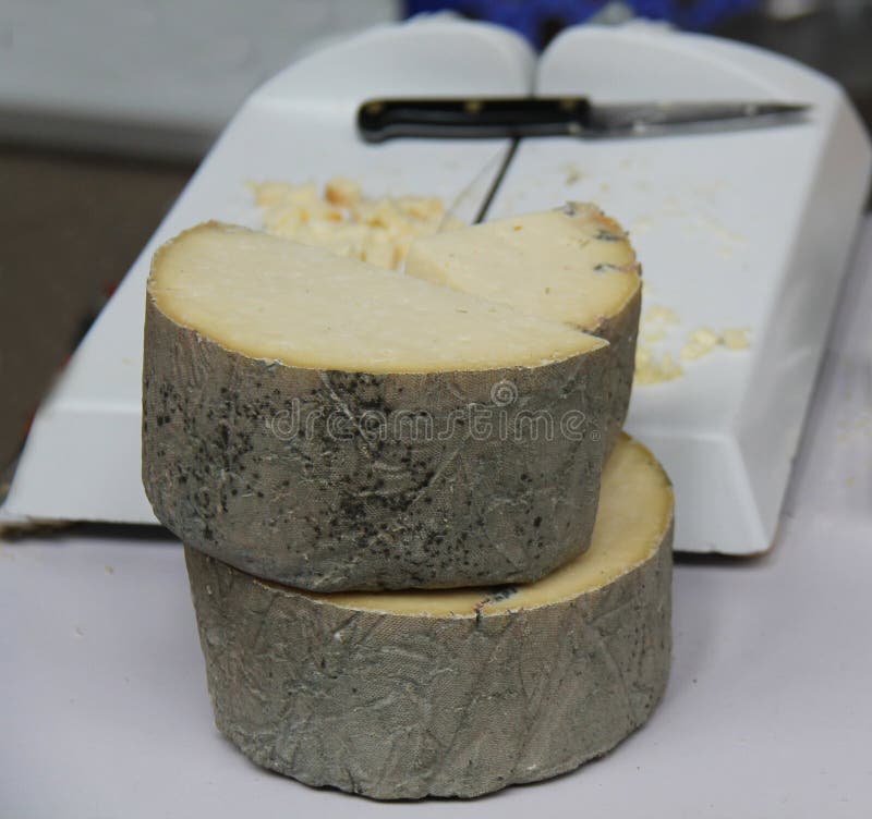 Wheels of Blue Cheese. stock photo. Image of wheels - 287390726