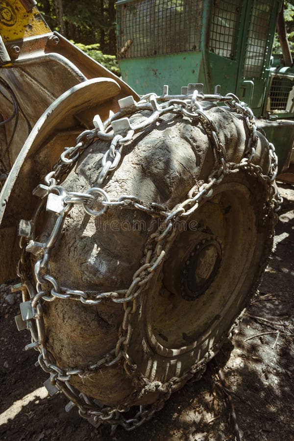 Wheels with mud chains stock image. Image of vehicle - 346945871