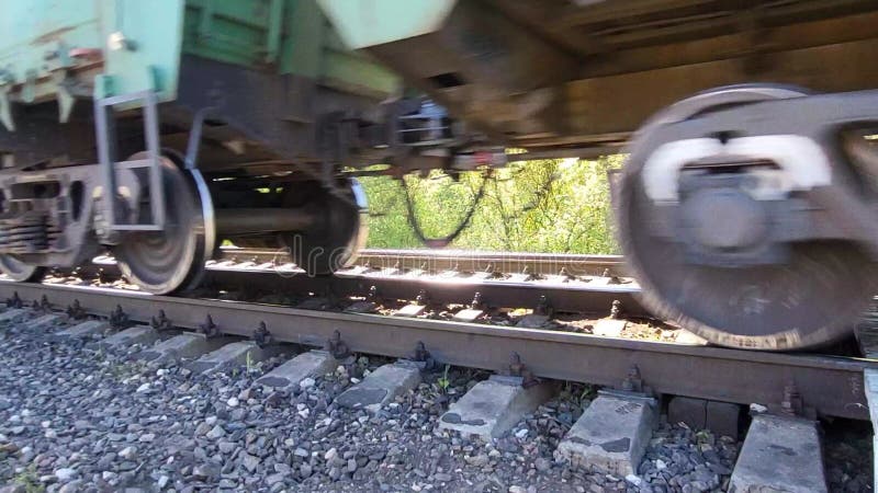 The Wheels of an Old Train on the Railway Tracks Run Past the Camera ...