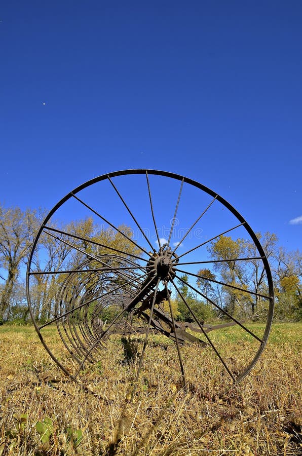 The Wheels and Tinsel an Old Dump Rake Stock Photo - Image of horse ...