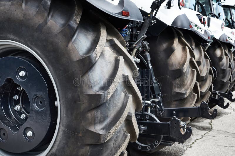 Wheels of Tractor Agricultural Machines Stock Photo - Image of loaders ...