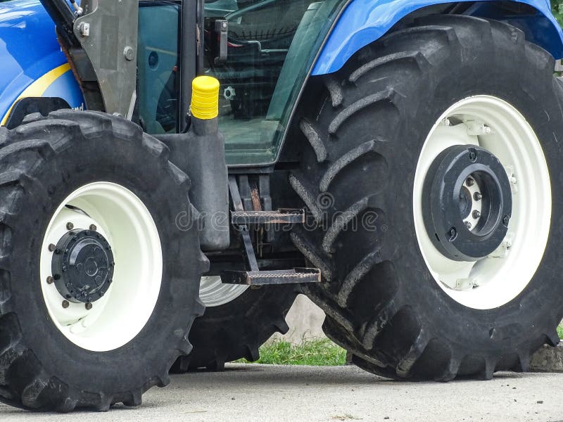 The Wheels of a Tractor Seen from the Side Stock Photo - Image of ...