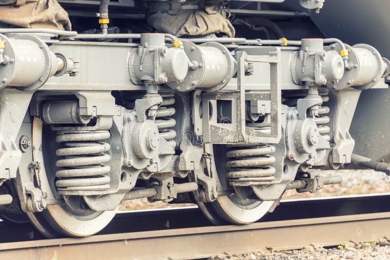 Train wheels on rails stock photo. Image of chassis - 127083616