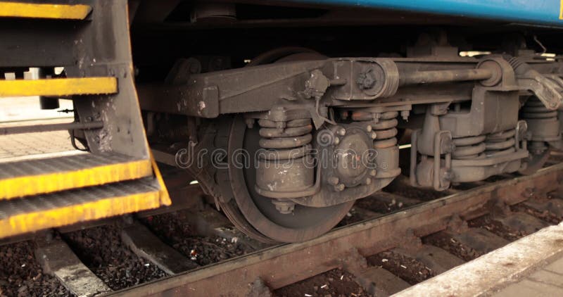The Wheels of a Train that Started Moving from the Station. Stock ...