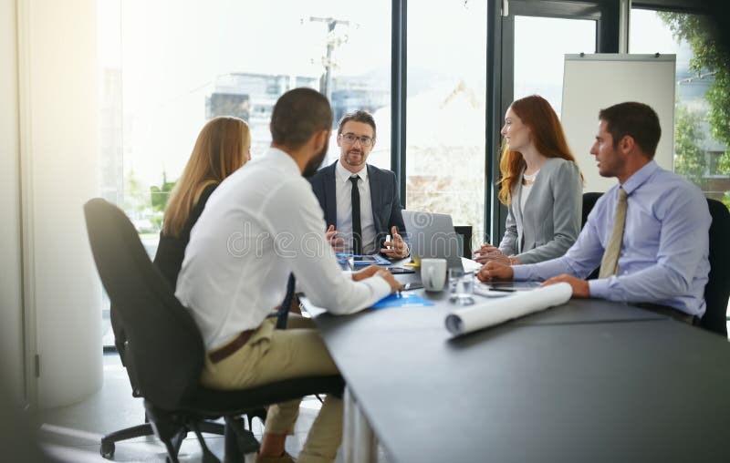 Where it All Begins. Businesspeople in a Meeting. Stock Photo - Image ...