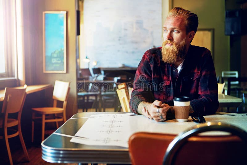 Where he Comes To Think. a Male Hipster in a Coffee Shop. Stock Image ...