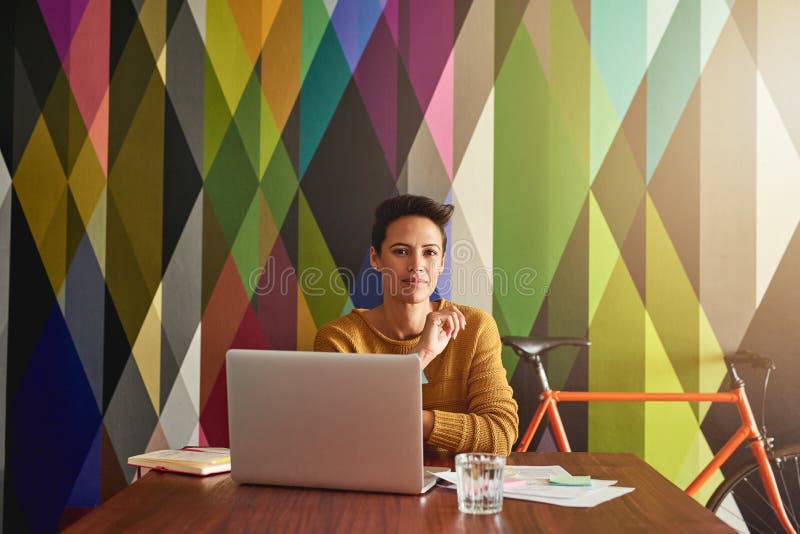 Where she Feels Most Comfortable. a Creative Employee Working in a ...