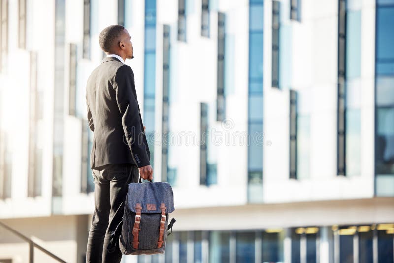 This is Where Great Ideas Happen. a Businessman Looking at a Building ...