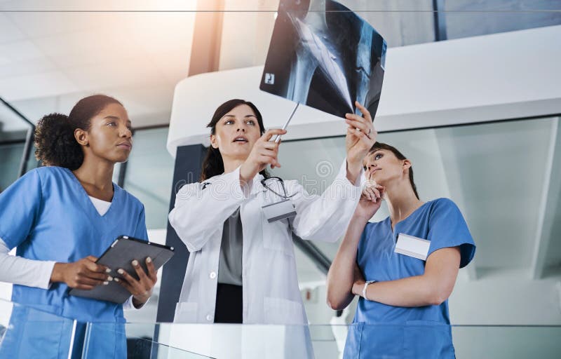 This is Where the Patient is Experiencing Pain. a Group of Doctors ...