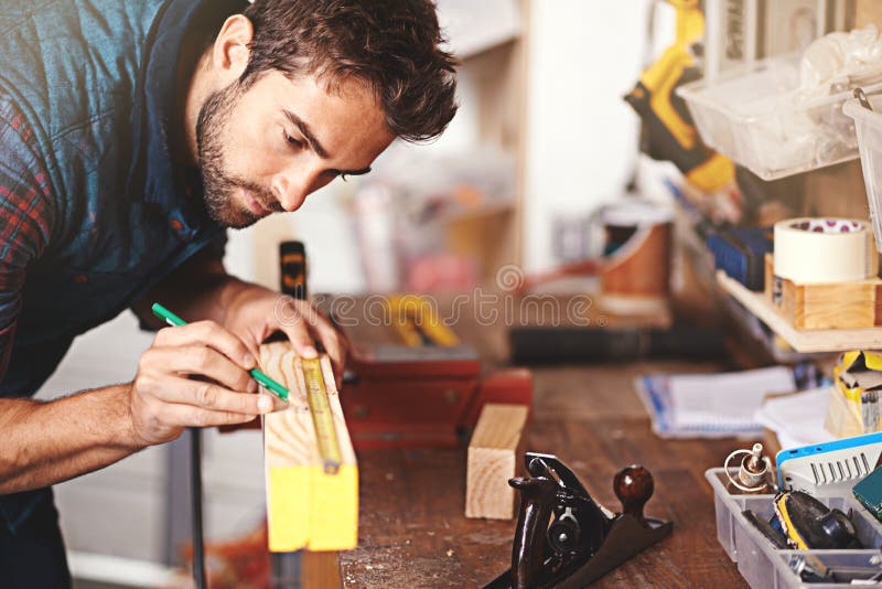 This is Where Skill Comes into Play. a Carpenter Making Measurements on ...