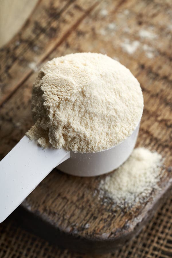 Whey Protein Powder in a Measuring Cup Stock Photo - Image of food ...