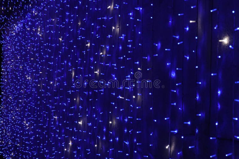 Close Up of a Wall Completely Covered with Small Colored Light Bulbs ...