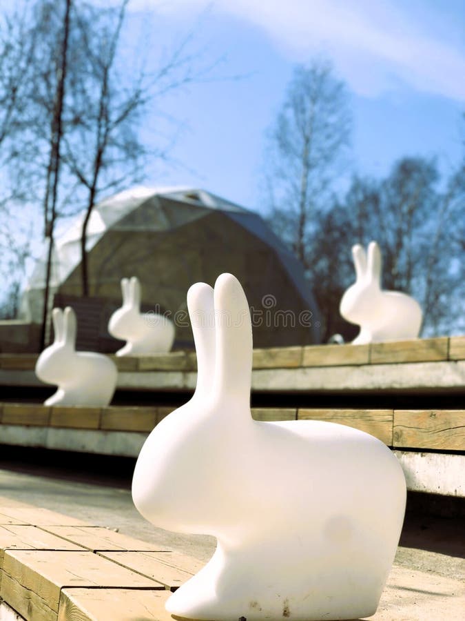 Whimsical White Rabbit Sculptures in an Outdoor Setting Stock Photo ...