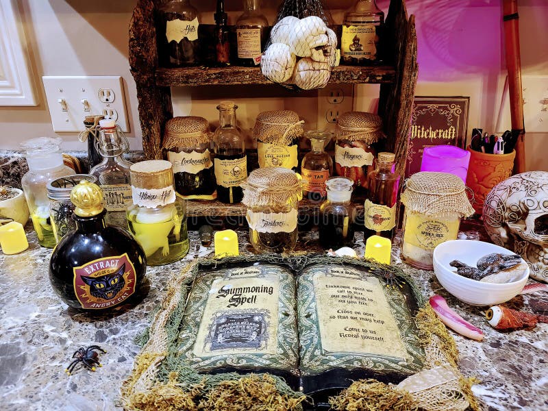 Whimsical Witchcraft Potion Display with Spell Book and Halloween Props ...