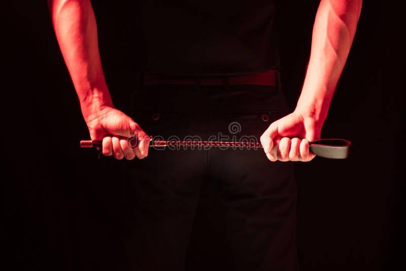 Whip in Hand Behind the Man. BDSM Stock Image - Image of flogger, male ...