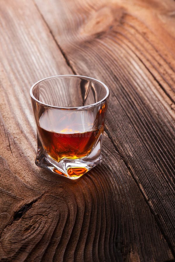 Whiskey, Bourbon, Brandy, or Cognac on Log Table Stock Photo - Image of ...