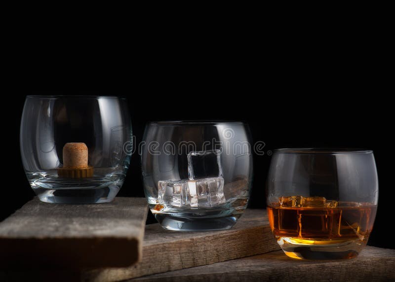 Whiskey, Bourbon, Brandy, or Cognac on Log Table Stock Photo - Image of ...