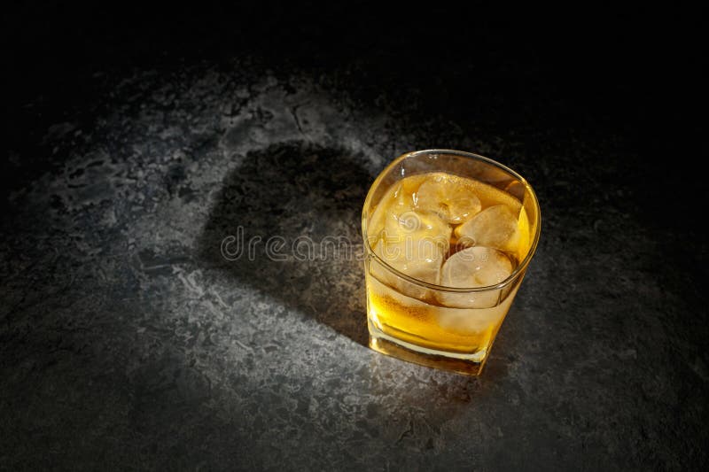 Whiskey in a Crystal Glass with Ice on a Old Stone Table Stock Image ...