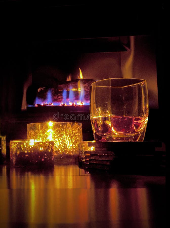 Whiskey by the Fire stock image. Image of glass, alcohol - 68237823