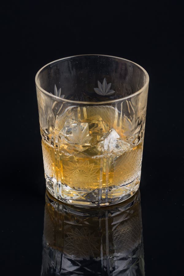 Whiskey with Ice in Rocks Glass on Black Background with Clipping Path ...