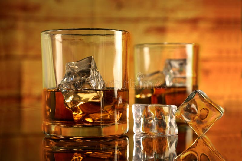 Whiskey Rum Glasses with Ice Cubes Stock Image - Image of bourbon ...