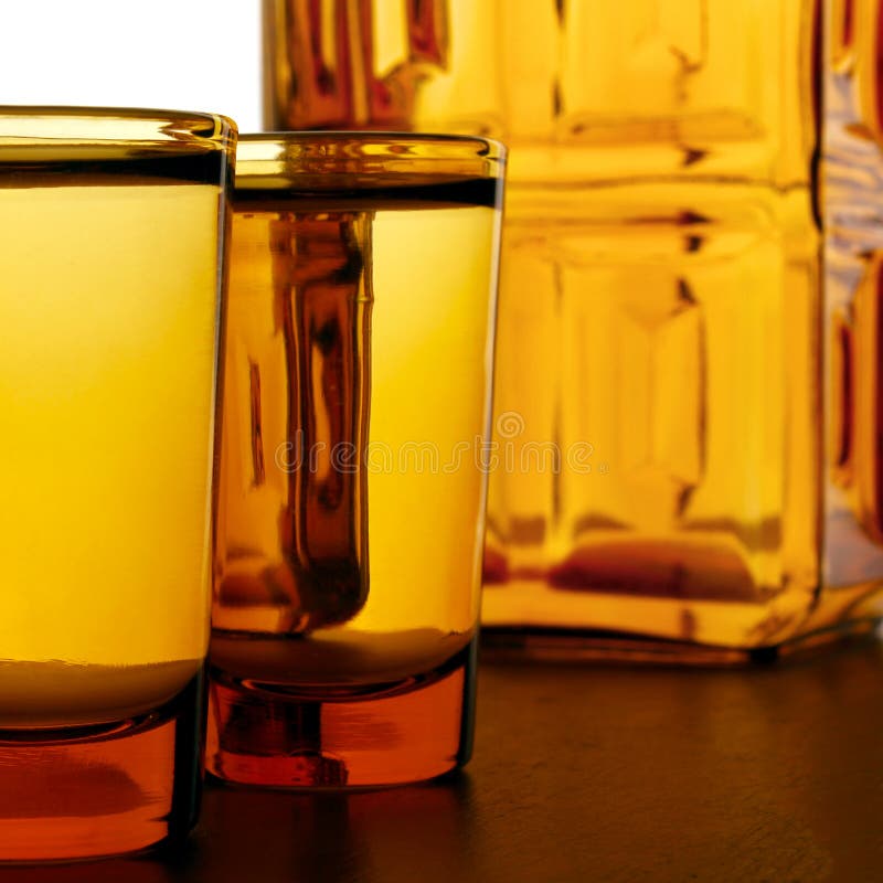 Whiskey Shots and Bottle stock image. Image of table - 34662765