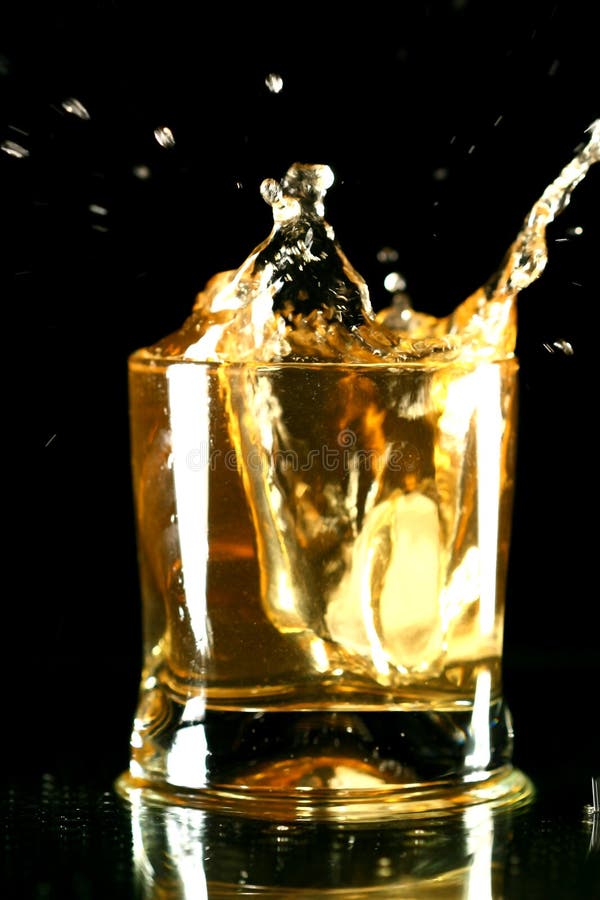 Whiskey splash stock photo. Image of close, celebration - 36320120