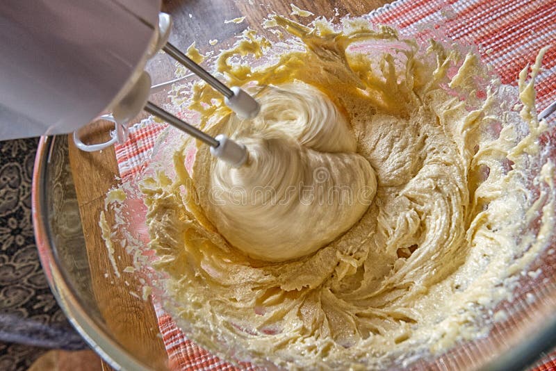 Whisking a cake mixture. stock photo. Image of theslowwalkers - 182344170