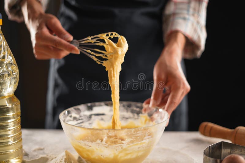 Whisking Dough Mixture in Bowl during Baking Preparation, Close-up ...