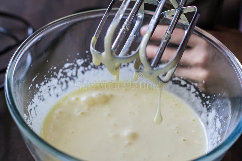 Whisking dough mixture stock image. Image of kitchen - 84187777