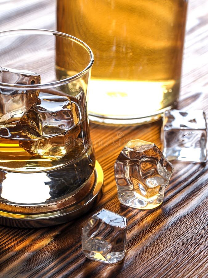 Whisky on the rocks stock image. Image of aged, rocks - 169062289