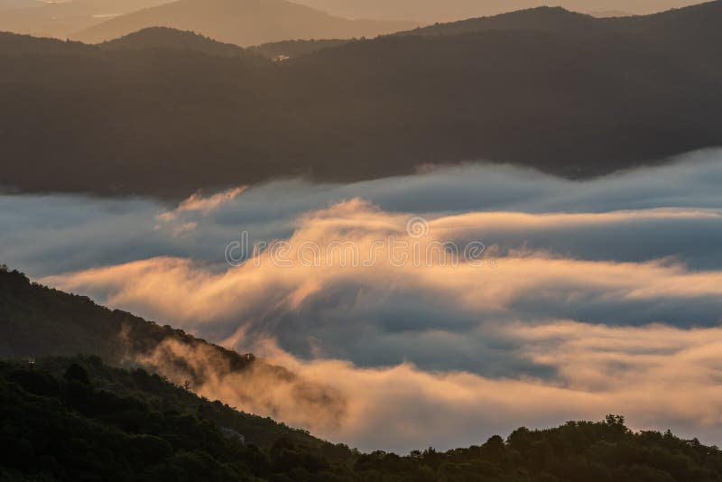 Whispy Clouds Cling To the Blue Ridge Mountains Stock Photo - Image of ...