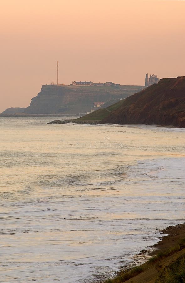 Whitby cliffs stock image. Image of water, cliff, surf - 4975489
