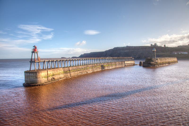 Whitby Pier stock photo. Image of pier, beach, ocean - 28564556