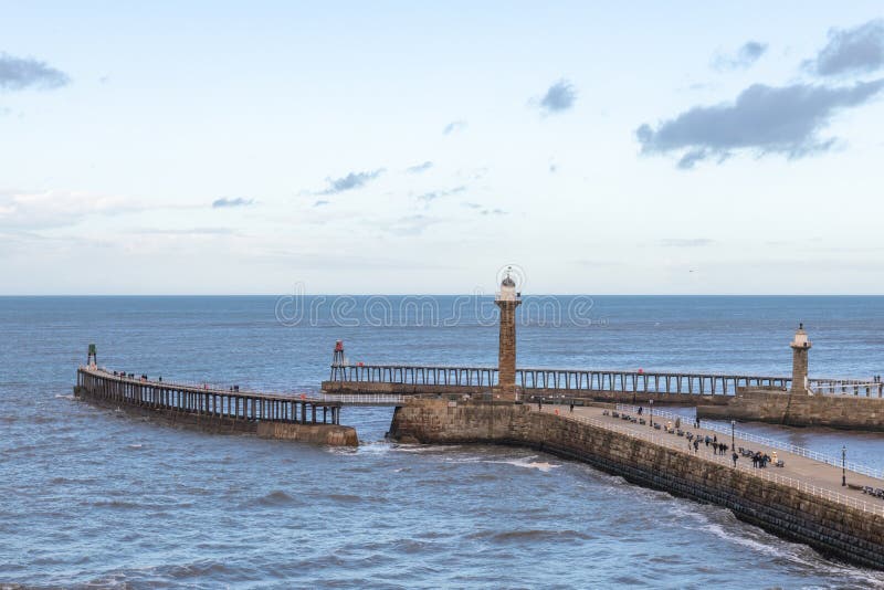 Whitby pier stock image. Image of lighthouse, idyllic - 243727633