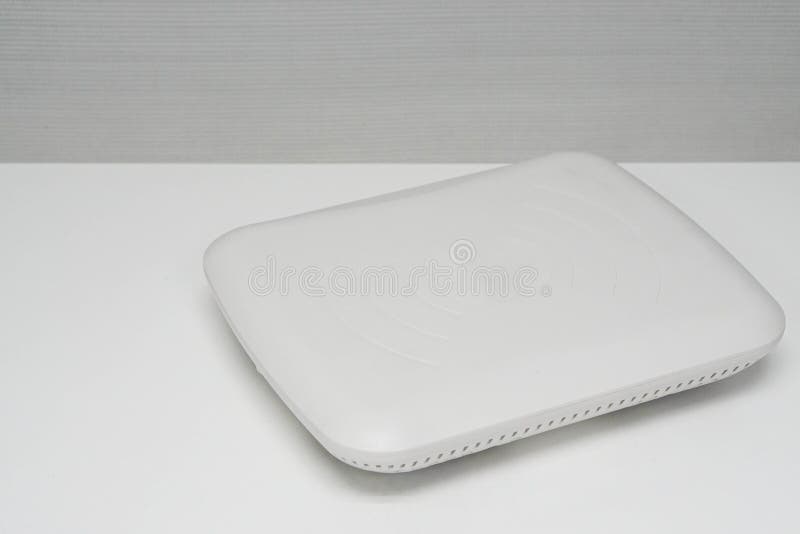 White access point on desk stock image. Image of computer - 80732629