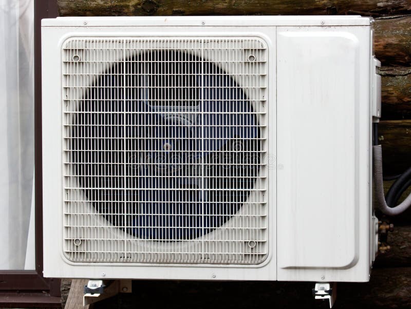 A White Air Conditioner with a Blue Filter Stock Photo - Image of ...
