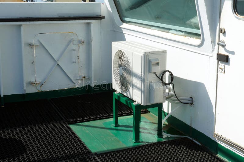 A White Air Conditioner is Mounted on the Bridge Wing of a Docked ...