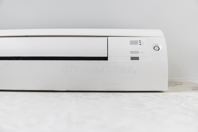 White Air Conditioner System on White Wall in a Room. Stock Photo ...