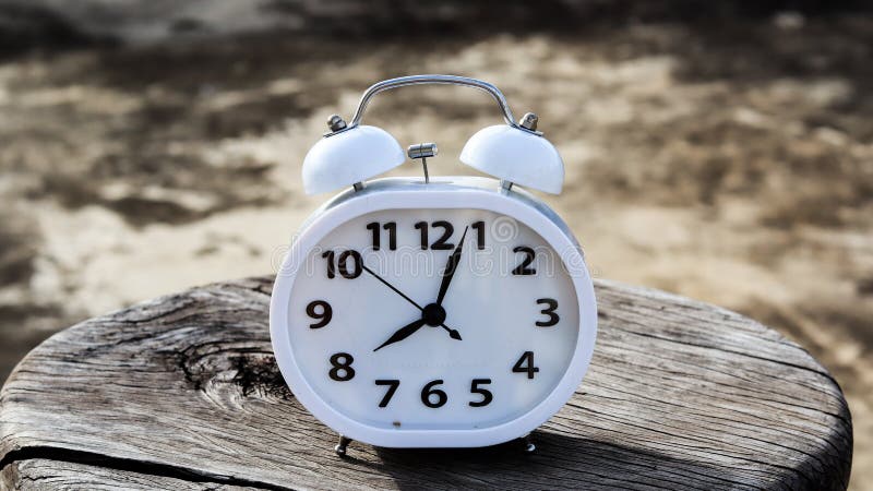 White Alarm Clock on an Old Chair in an Abandoned Area Stock Image ...