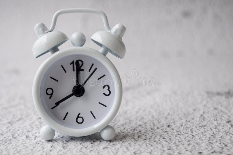 White Alarm Clock Pointing at 8am with Customizable Space for Text ...