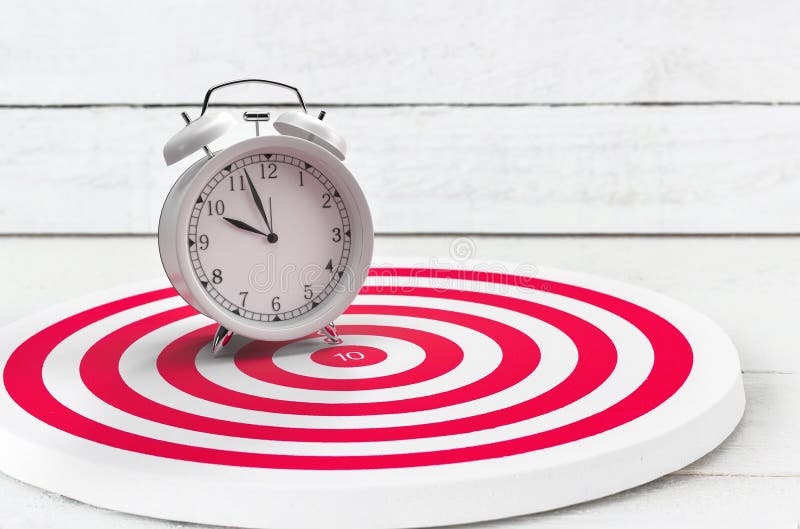 White Alarm Clock on Red Target Symbolizing Time Management and Goal ...