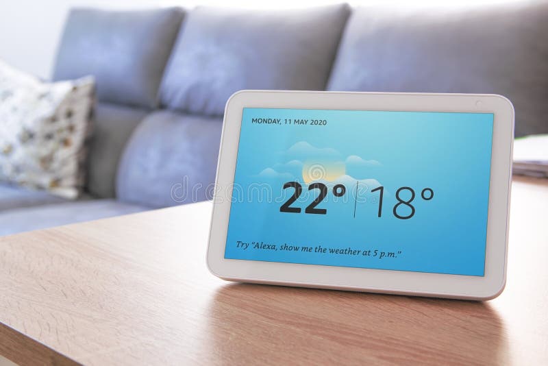 White Amazon Alexa Echo Show 8 in a Living Room. Empty Copy Space ...