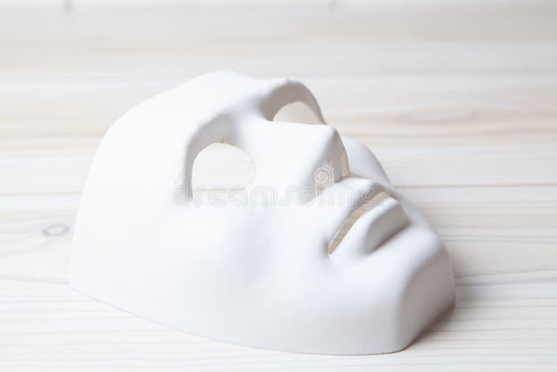 White Anonymous Mask on the Table Stock Photo - Image of table, person ...