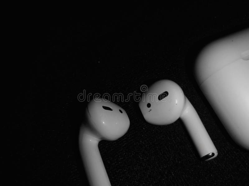 A White Apple Earbuds are Next To a White Apple. Stock Image - Image of ...