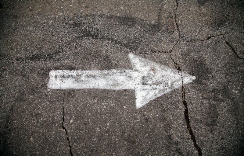 White Arrow on the Ground Pointing Right To the Future. Asphalt Sign ...