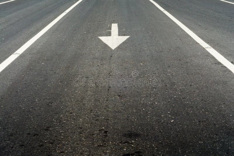 White Arrow and Line on Road Stock Photo - Image of texture, gray: 30744822